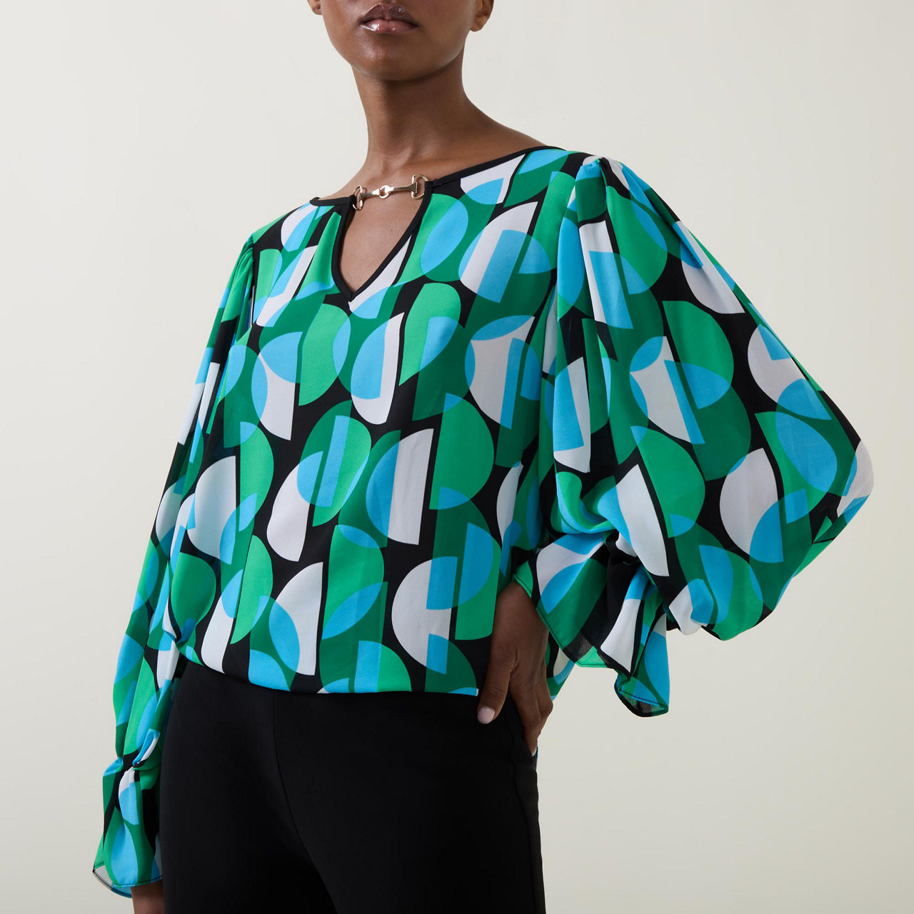 Geometric Flared-Cuff Top